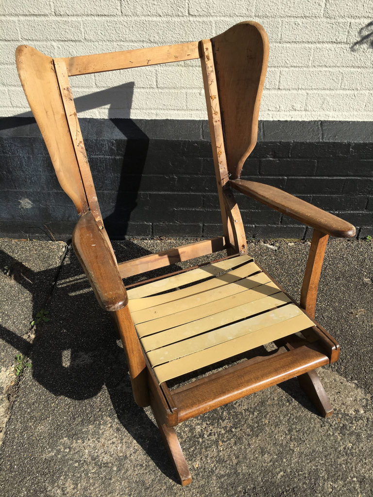 Wooden framed wing back chair. – Emily Craven New Interiors